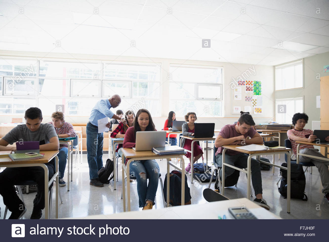 High school students digital tablets and laptops classroom Stock Photo ...