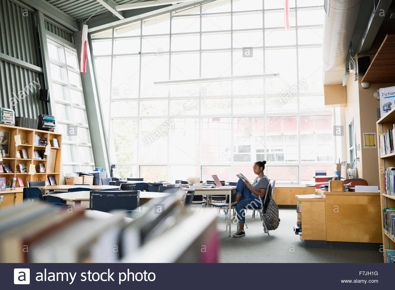 Teenage student studying in library hi-res stock photography and images ...