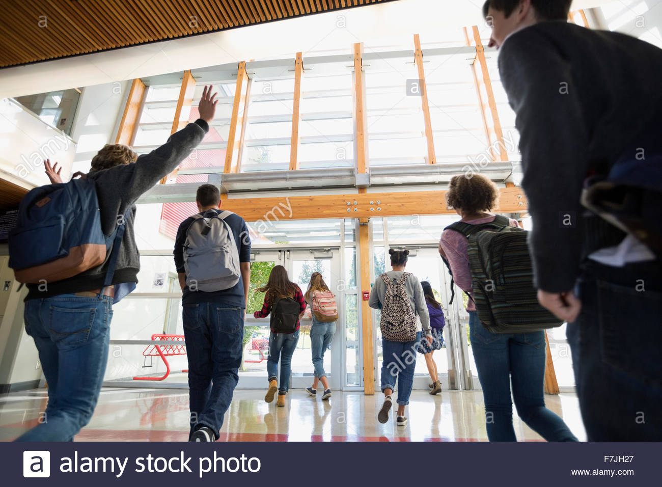 High school students leaving school hi-res stock photography and images ...