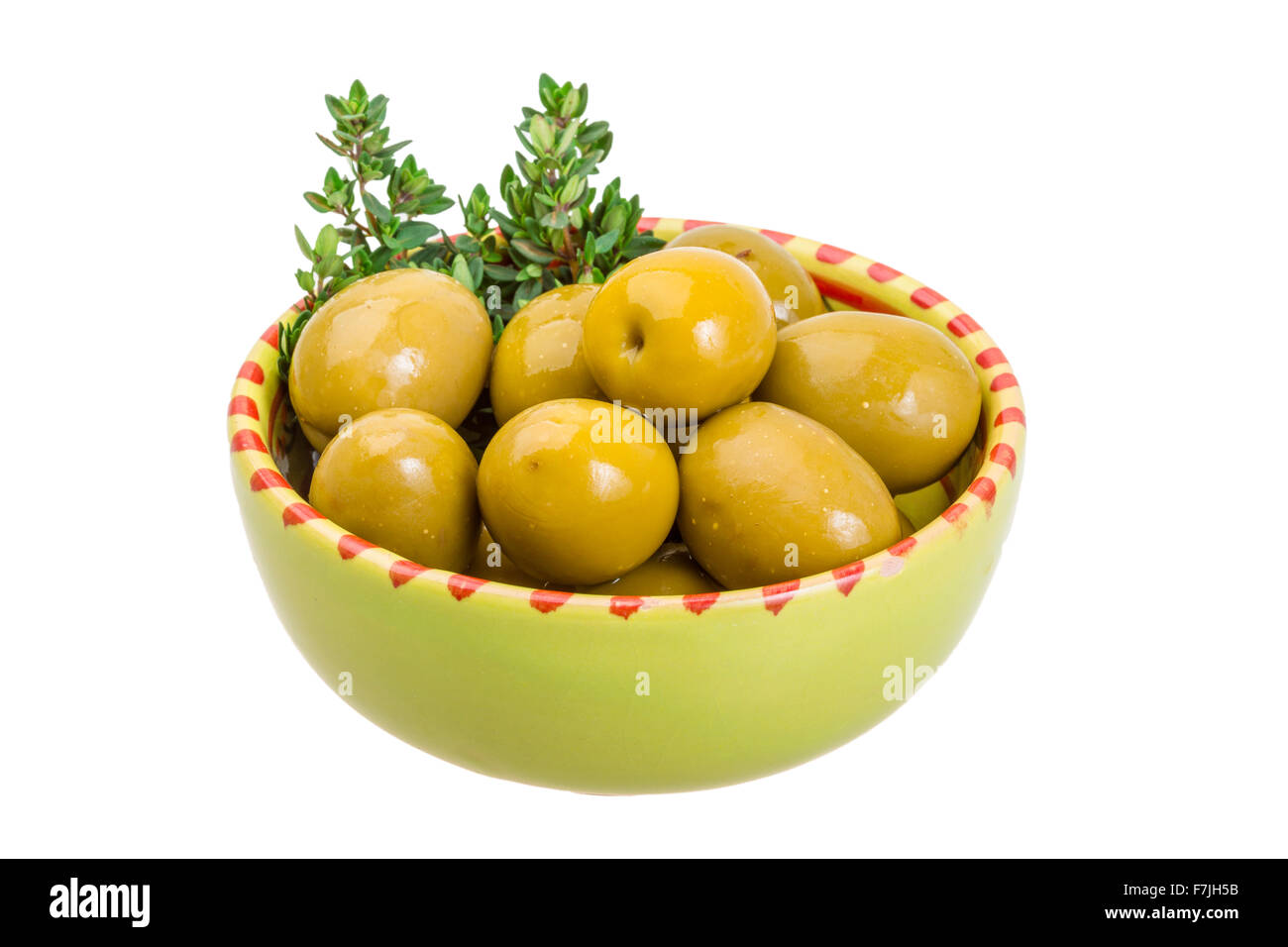 Green gigant olives with thyme Stock Photo - Alamy