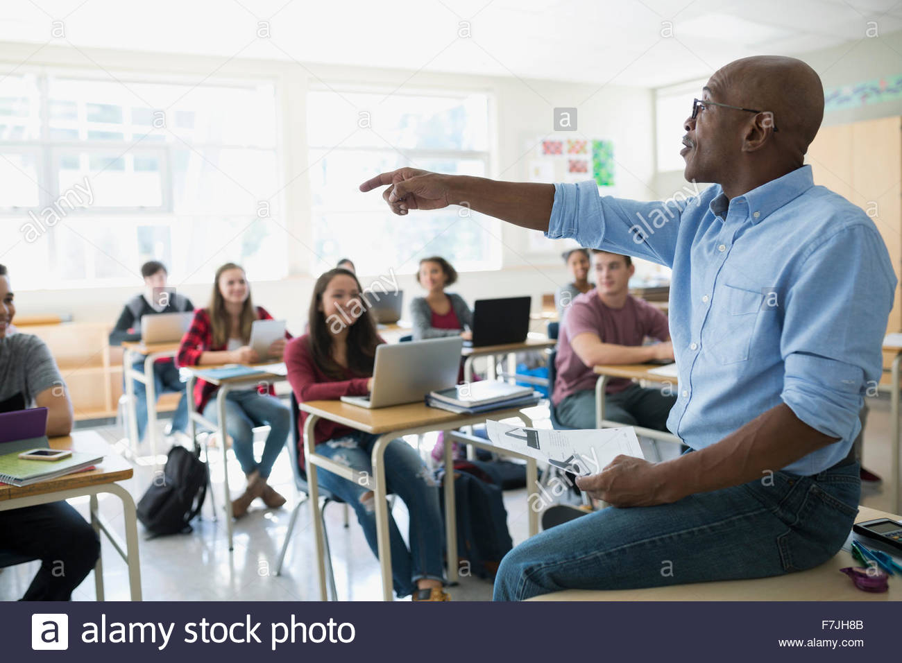 Teacher calling on student hi-res stock photography and images - Alamy