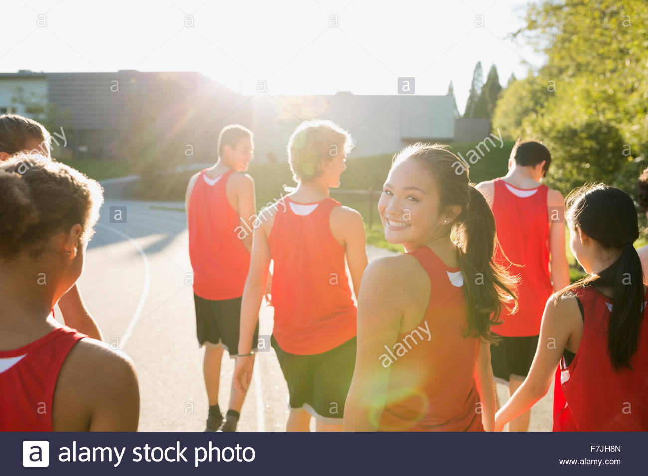 Child running looking back rear view hi-res stock photography and ...