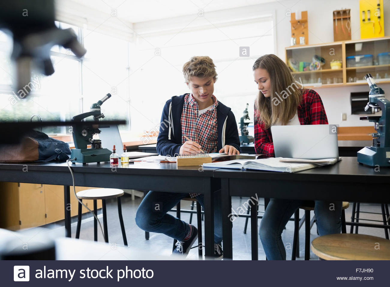 High school students studying in science laboratory classroom Stock ...