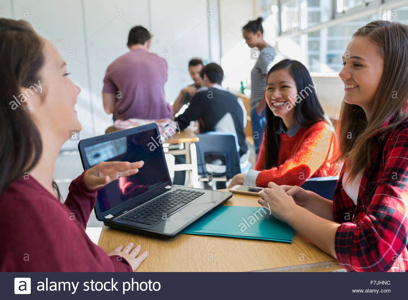High school students at laptop in classroom Stock Photo - Alamy
