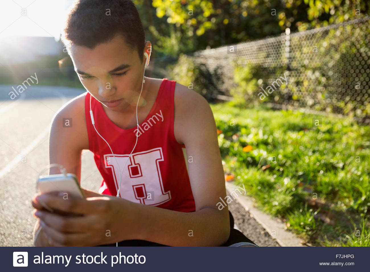 Boy on running track hi-res stock photography and images - Alamy