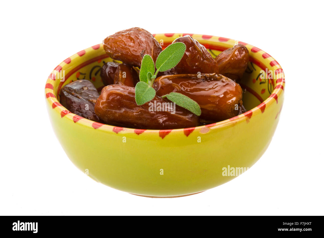 Dates with leaf on the plate Stock Photo - Alamy