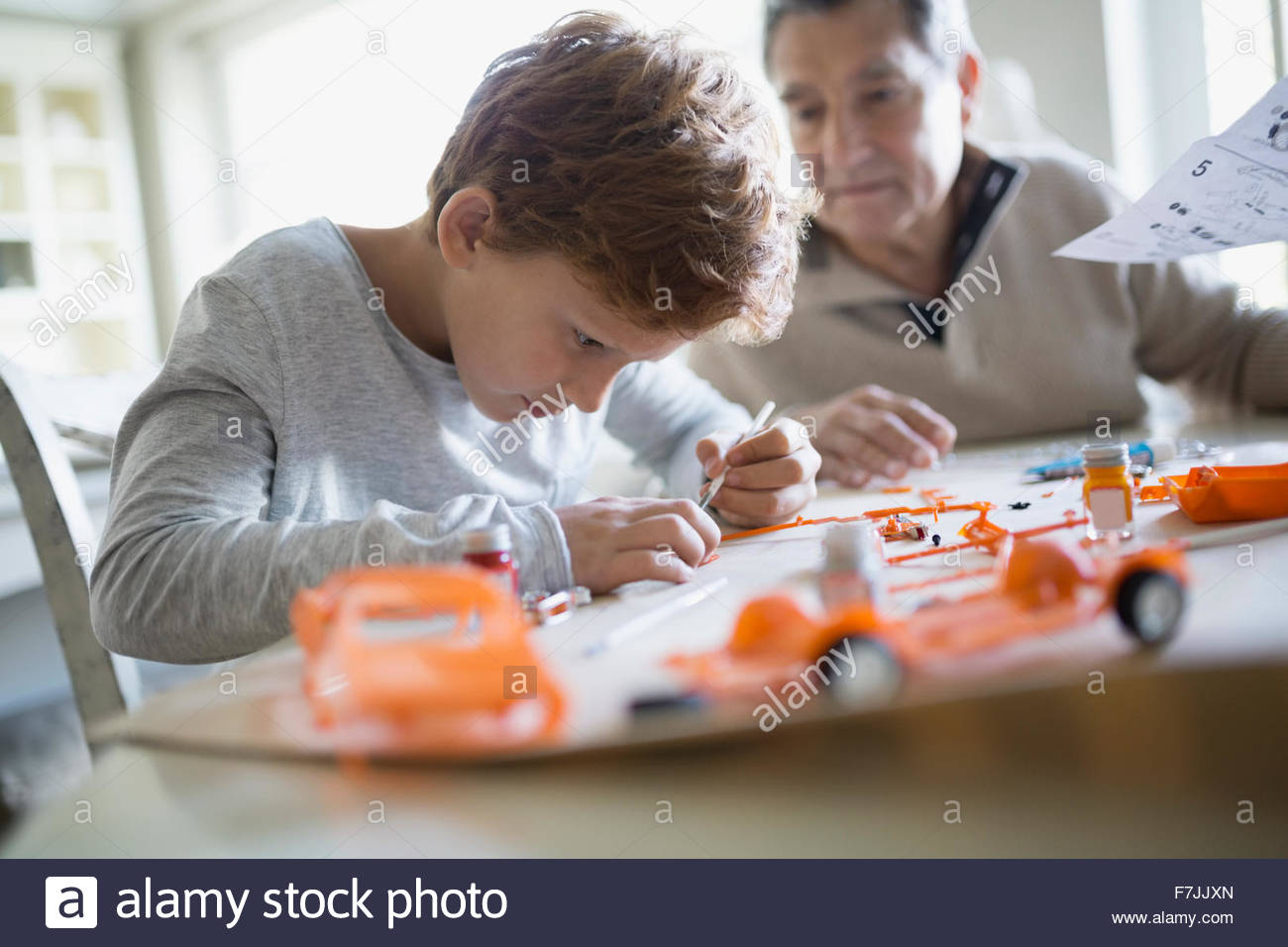 Assembling toy cars hi-res stock photography and images - Alamy