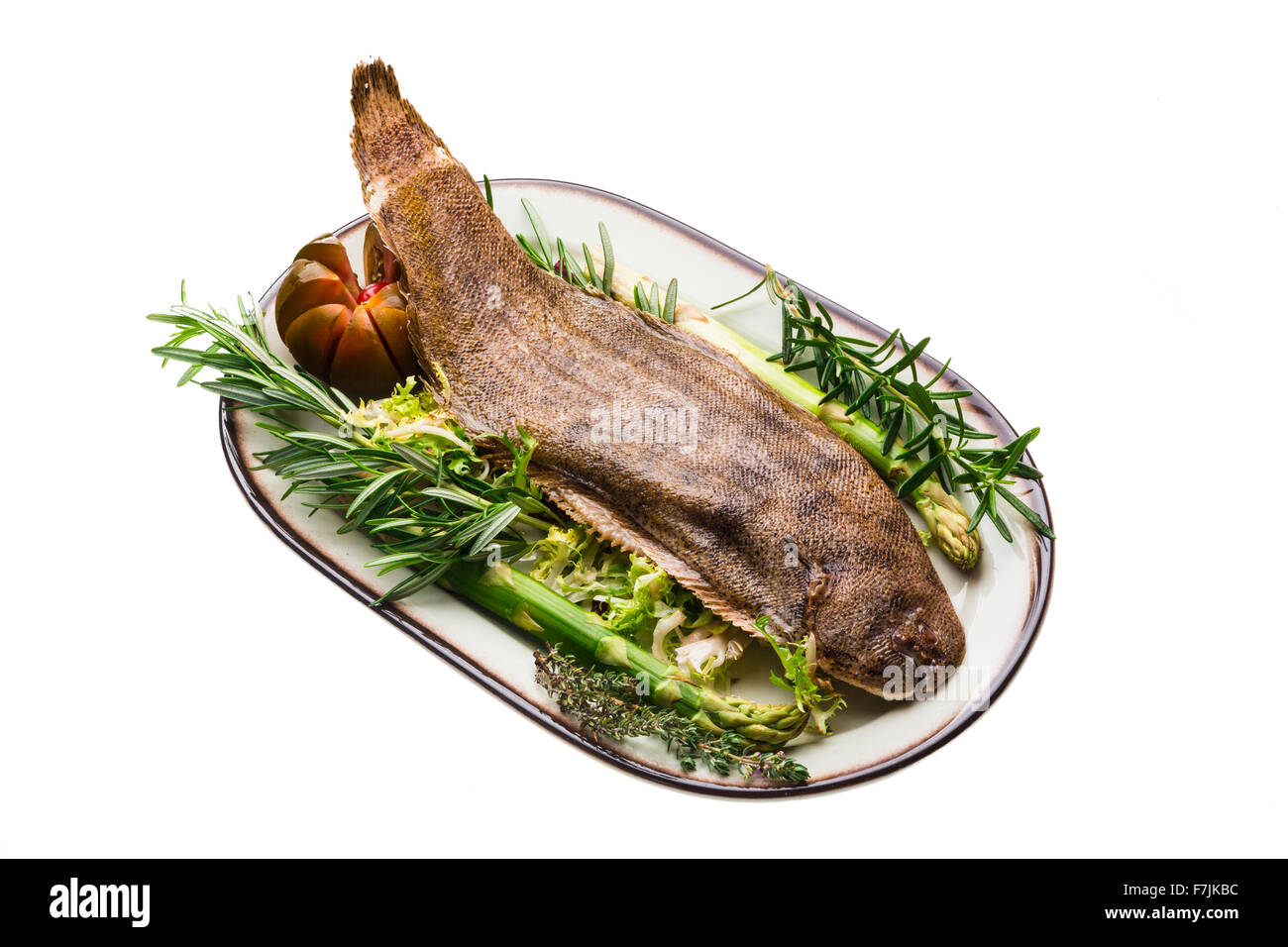 Fish Dover sole roasted Stock Photo - Alamy