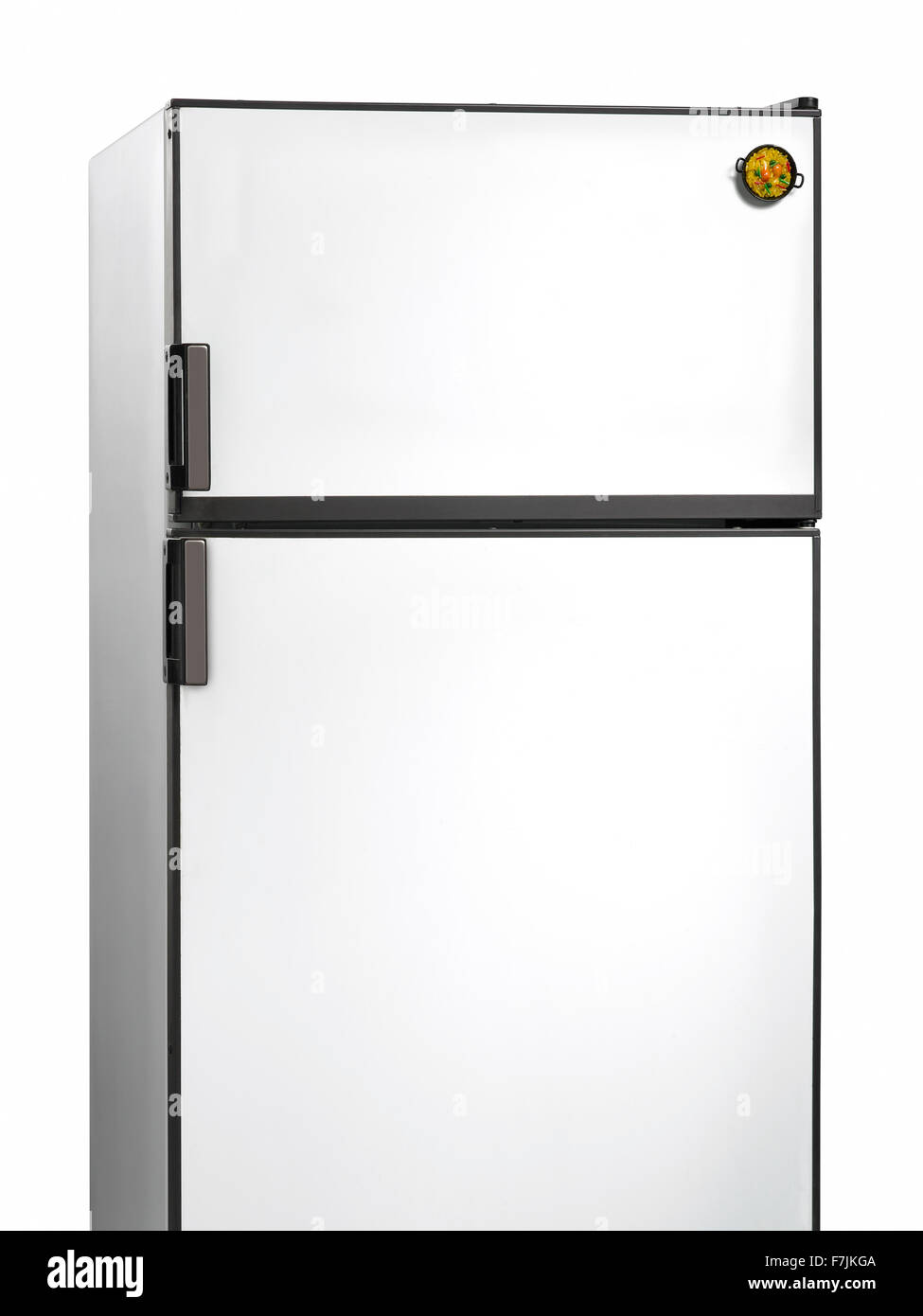 Old fridge with paella plastic magnet isolated on white background ...