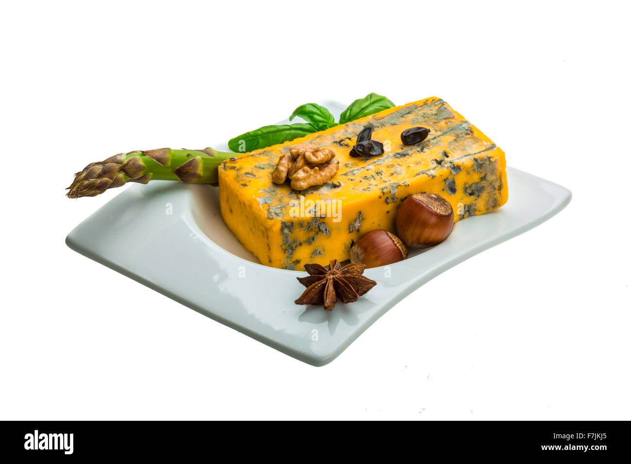 Gold cheese with mould Stock Photo - Alamy