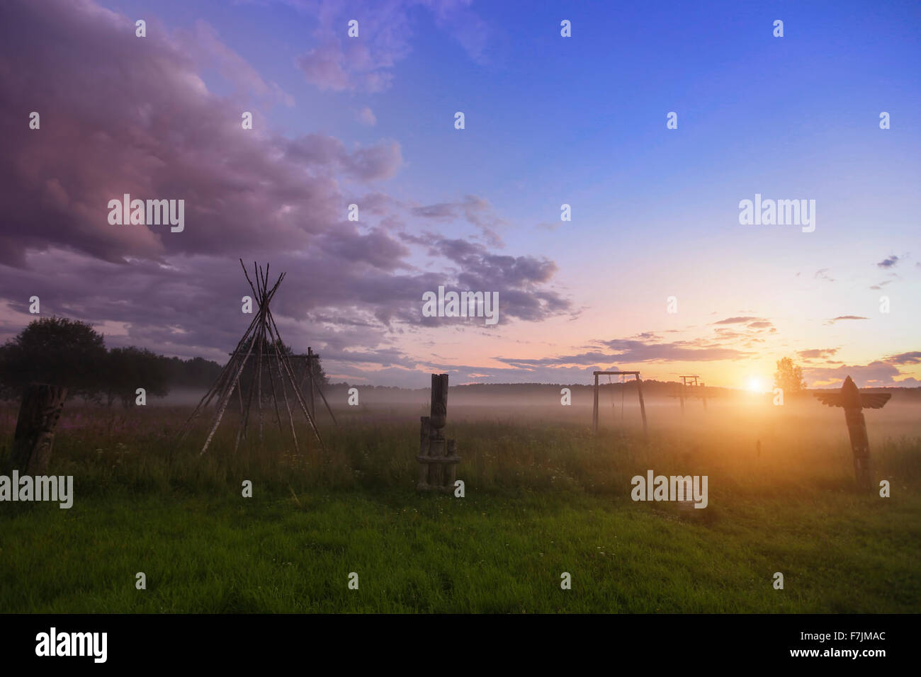 Magical sunset in rural areas, Green field and trees Stock Photo - Alamy