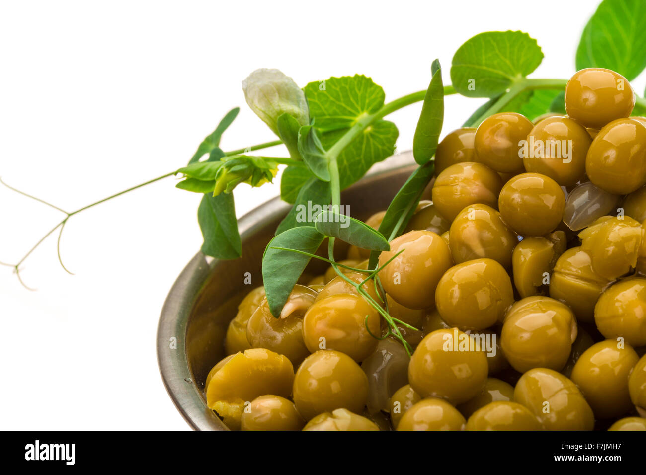 Marinated green peas with branch Stock Photo - Alamy