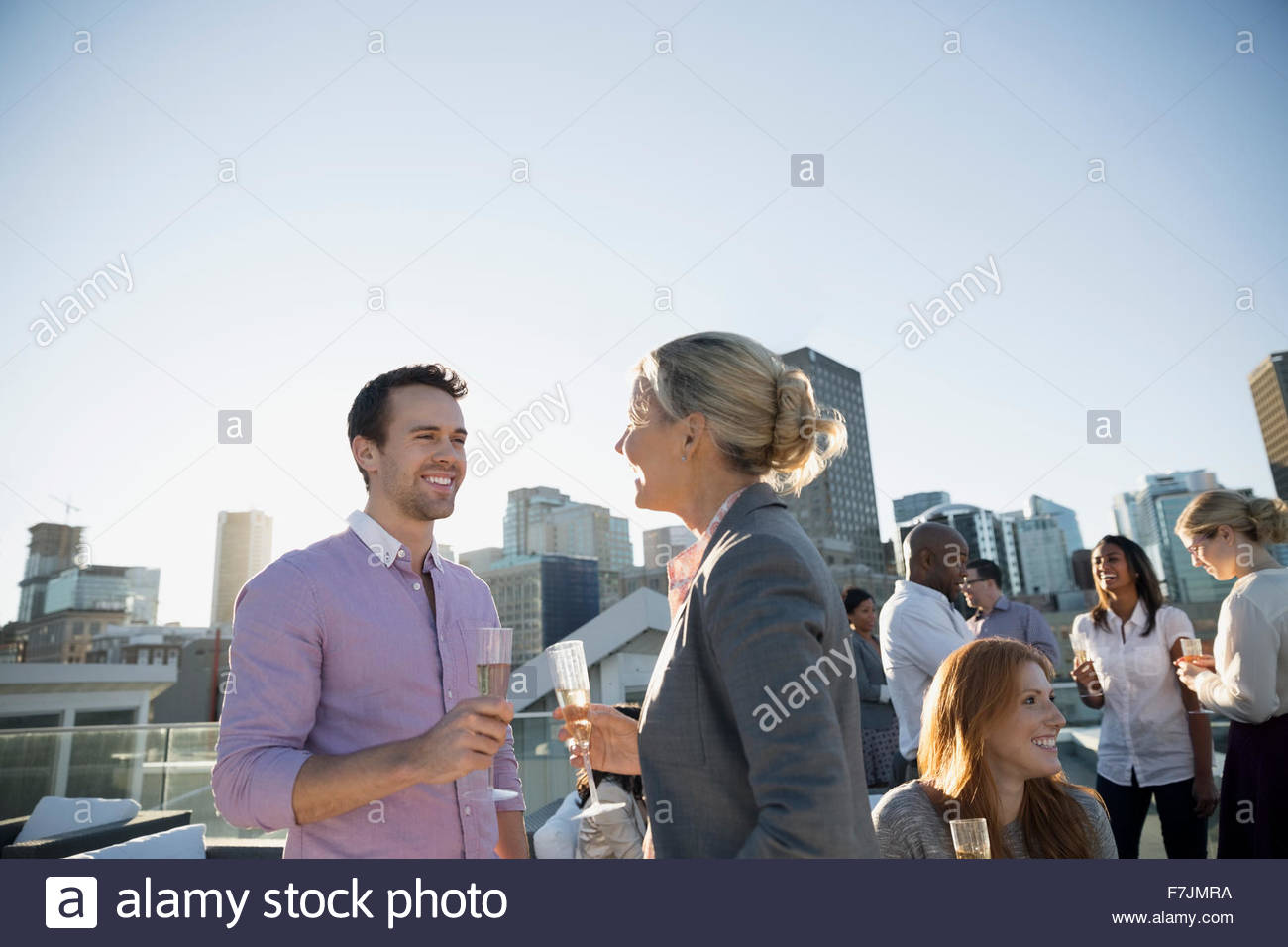 People enjoying rooftop view hi-res stock photography and images - Alamy