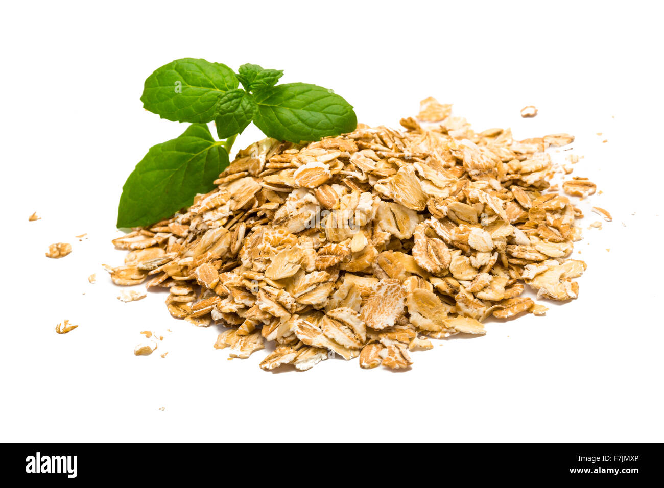 Oats pile with mint branch Stock Photo - Alamy