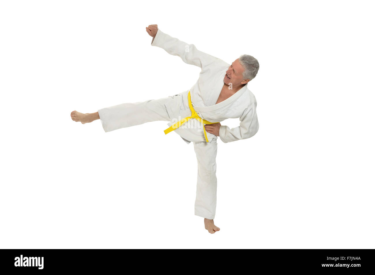 Senior man in karate pose Stock Photo - Alamy