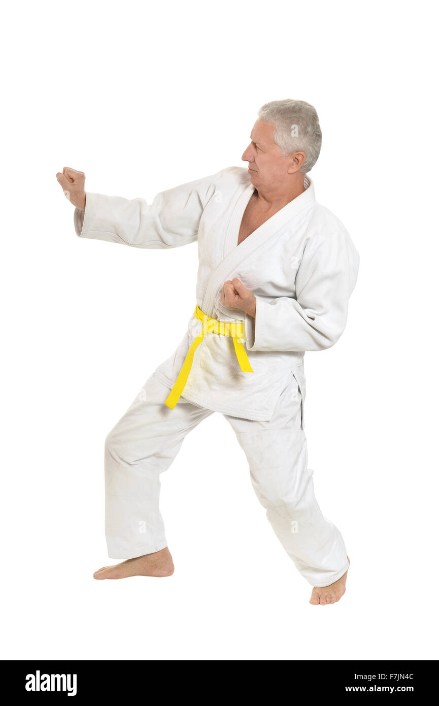 Senior man in karate pose Stock Photo - Alamy