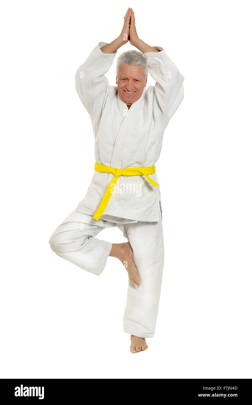 Senior man in karate pose Stock Photo - Alamy