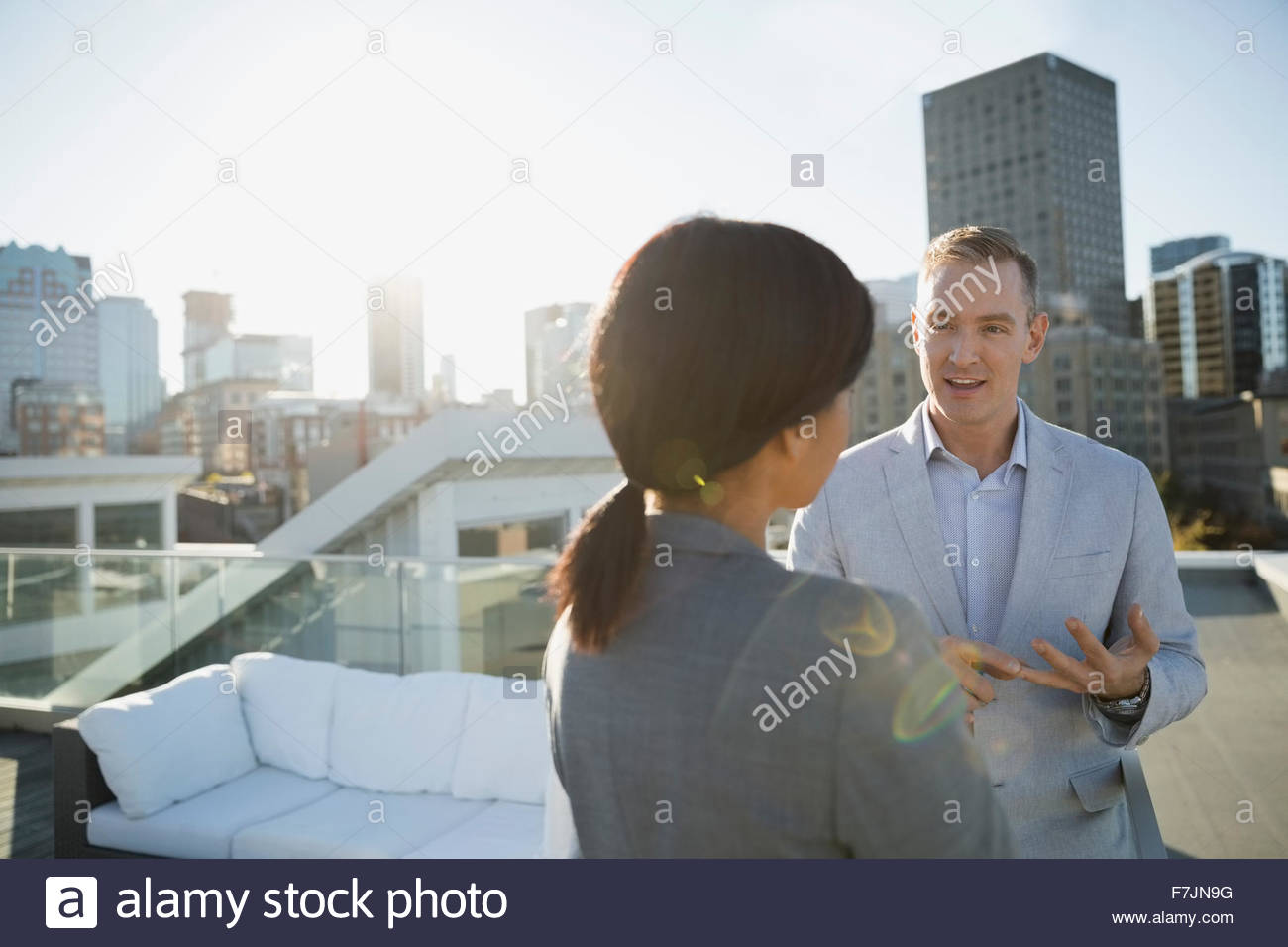 Rooftop teamwork hi-res stock photography and images - Alamy