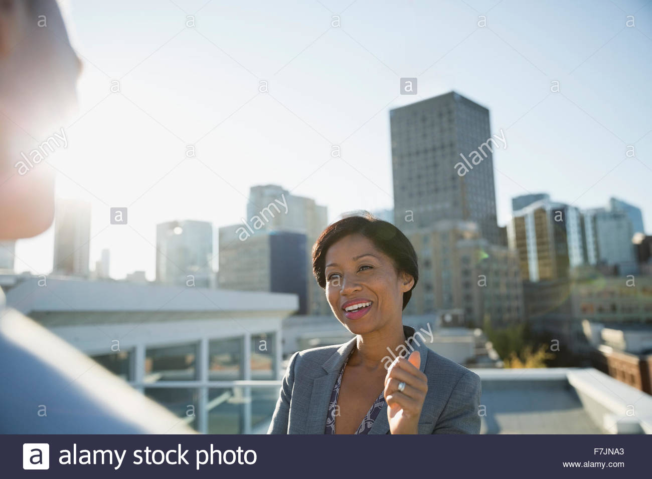 Business man standing on rooftop hi-res stock photography and images ...