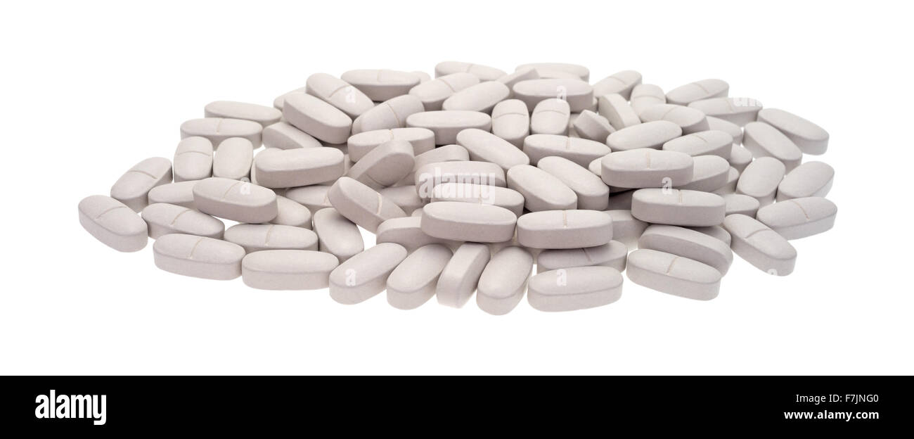 Multivitamin tablets isolated on a white background Stock Photo - Alamy