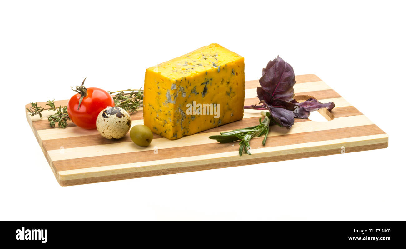 Yellow cheese with blue mold Stock Photo - Alamy