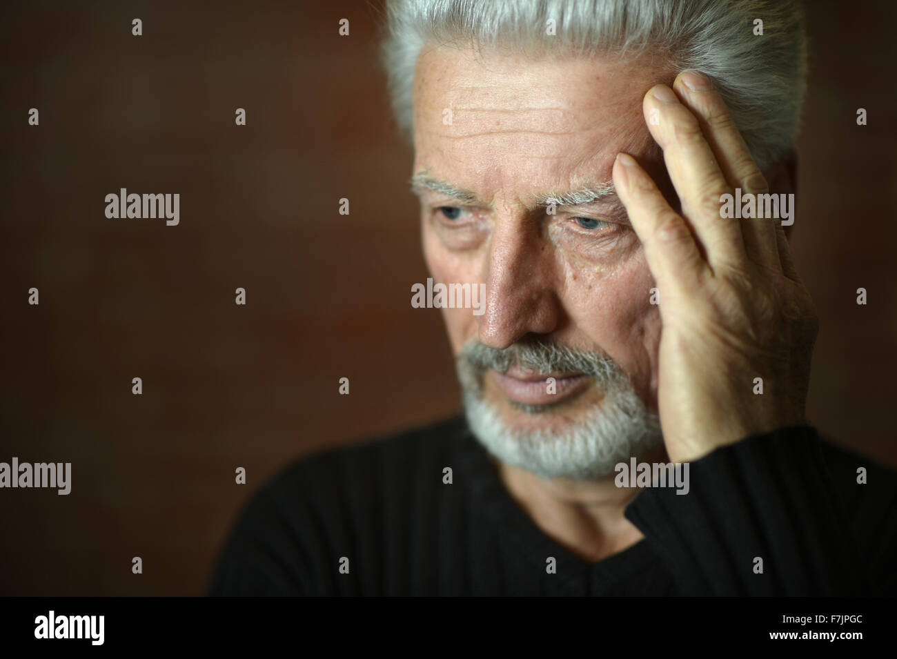 Sad senior man at home Stock Photo - Alamy