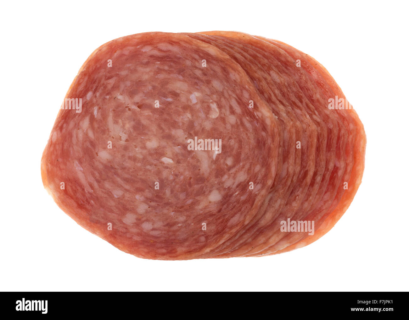 Top view of several slices of genoa salami on a white background Stock ...