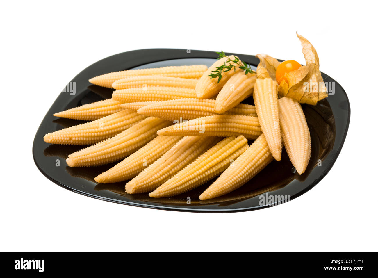 Baby corn isolated Stock Photo - Alamy