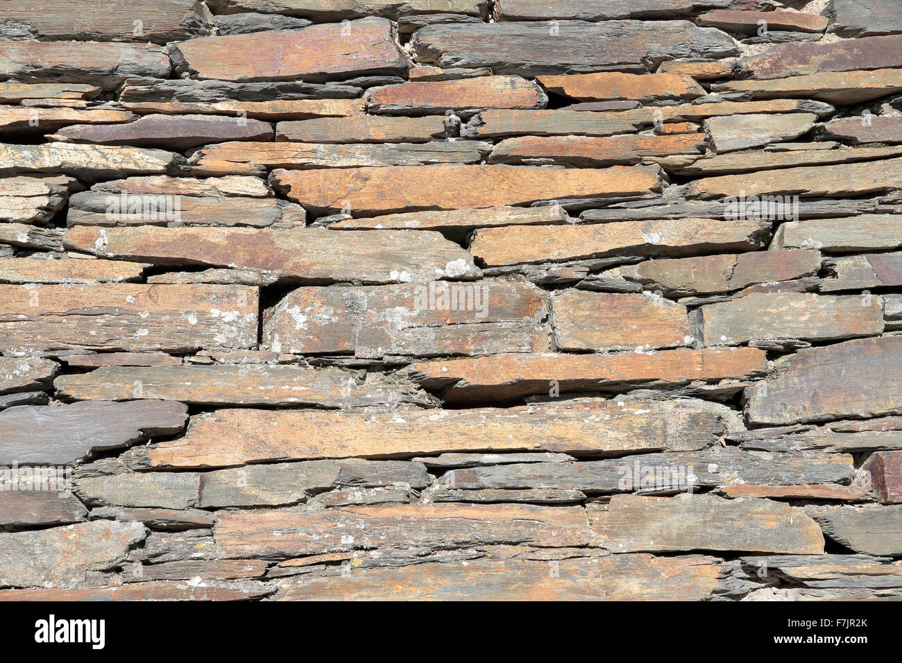 wall of slate bricks. Slate is typical of the villages of black ...