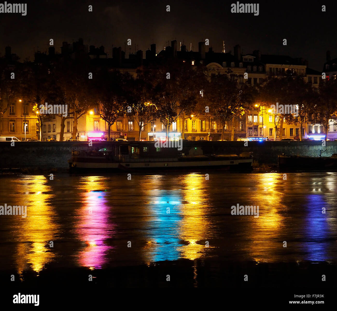 Night time reflections in the river in Lyon Southern France Stock Photo ...