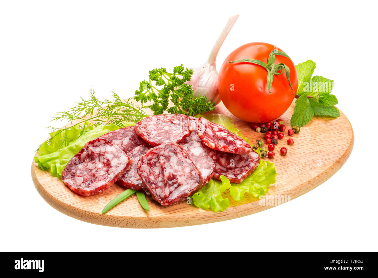 Fresh ripe salami with vegetables Stock Photo - Alamy