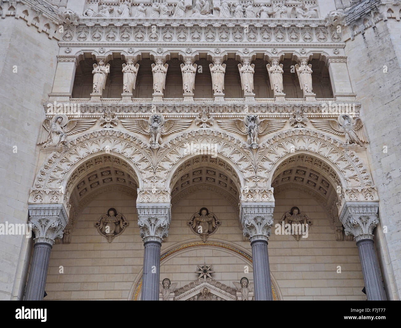 Very decorative arches and pillars to the entrance of Lyon Fourvière ...