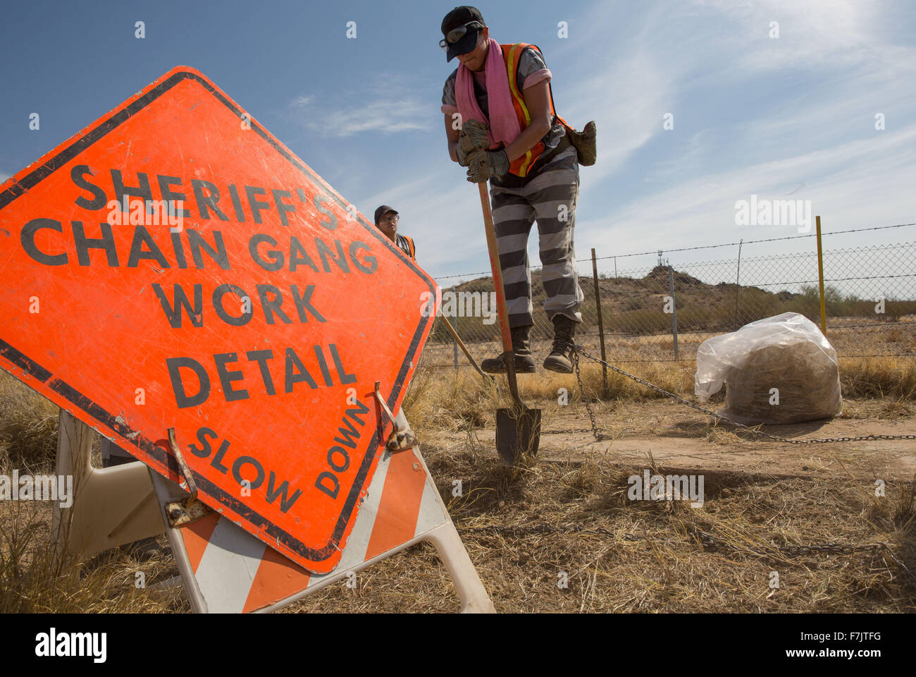 August, 24th, 2015, Phoenix, AZ, USA : Inmates perform weeding duty as ...