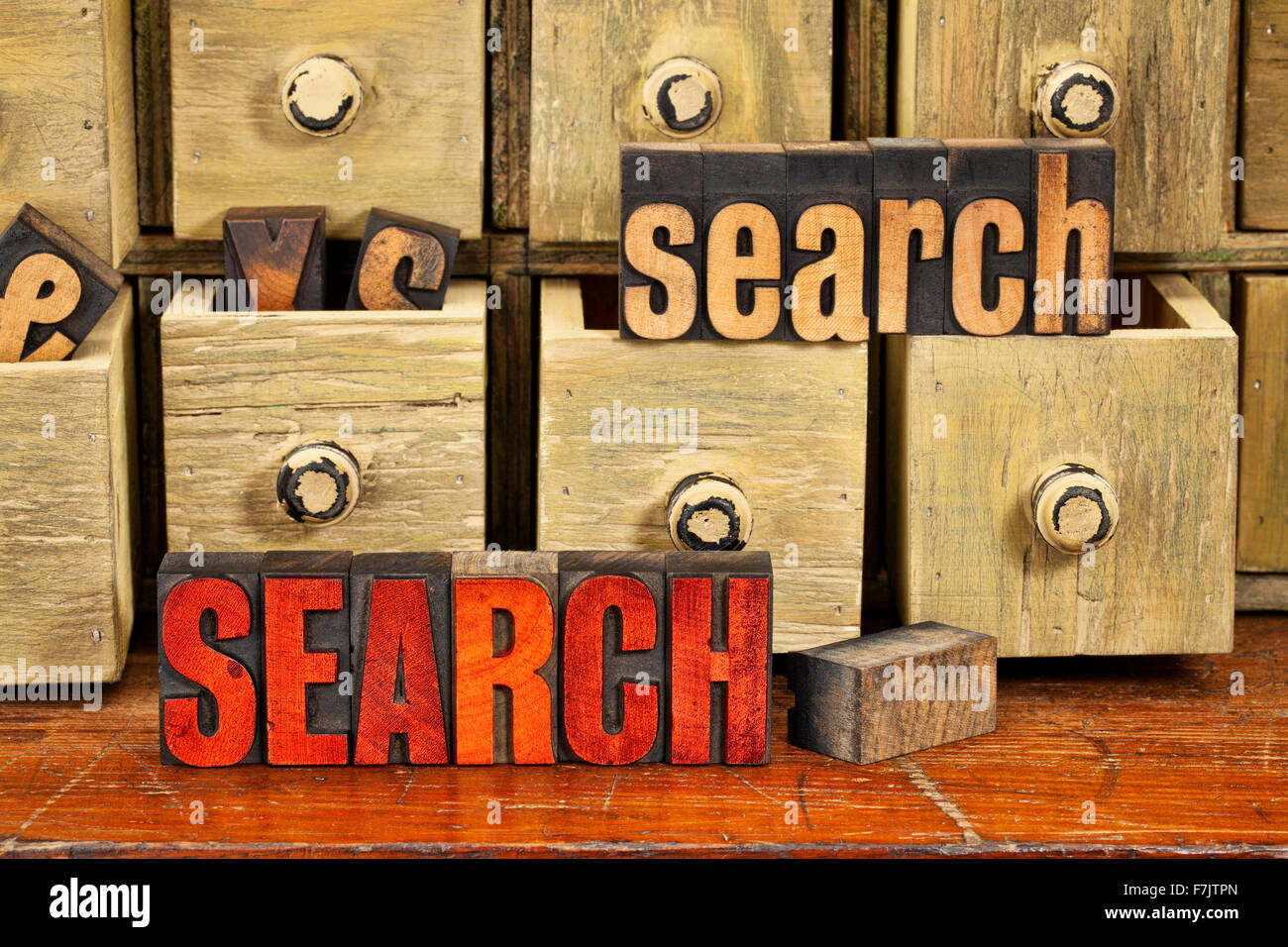 search word or SEO concept - vintage letterpress wood type stained by ...