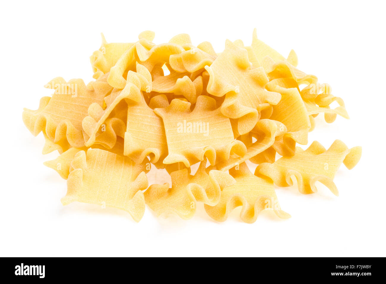 Raw yellow Italian pasta Stock Photo - Alamy