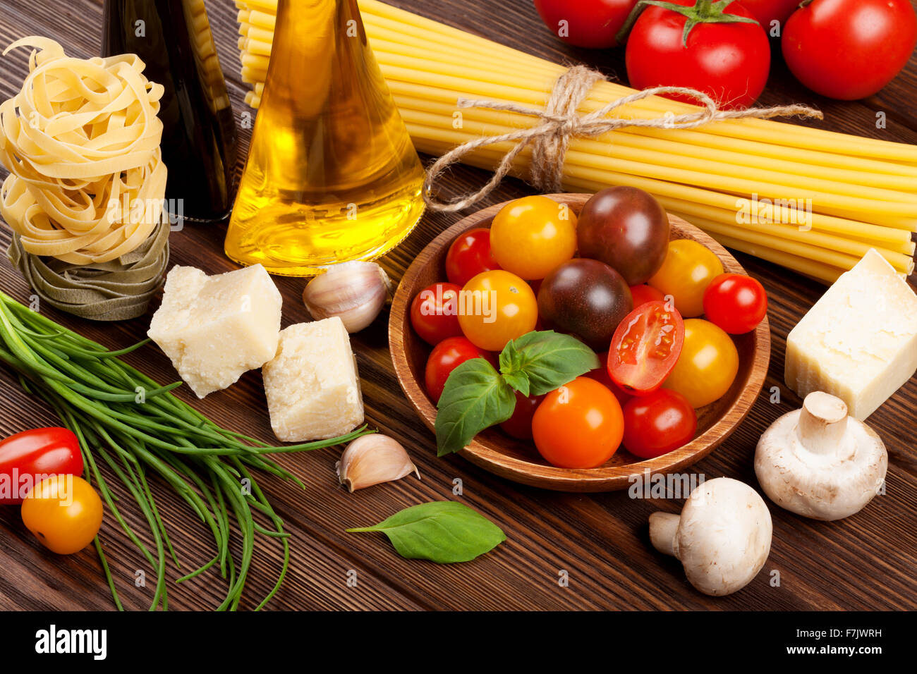 Italian food cooking ingredients. Pasta, vegetables, spices Stock Photo ...
