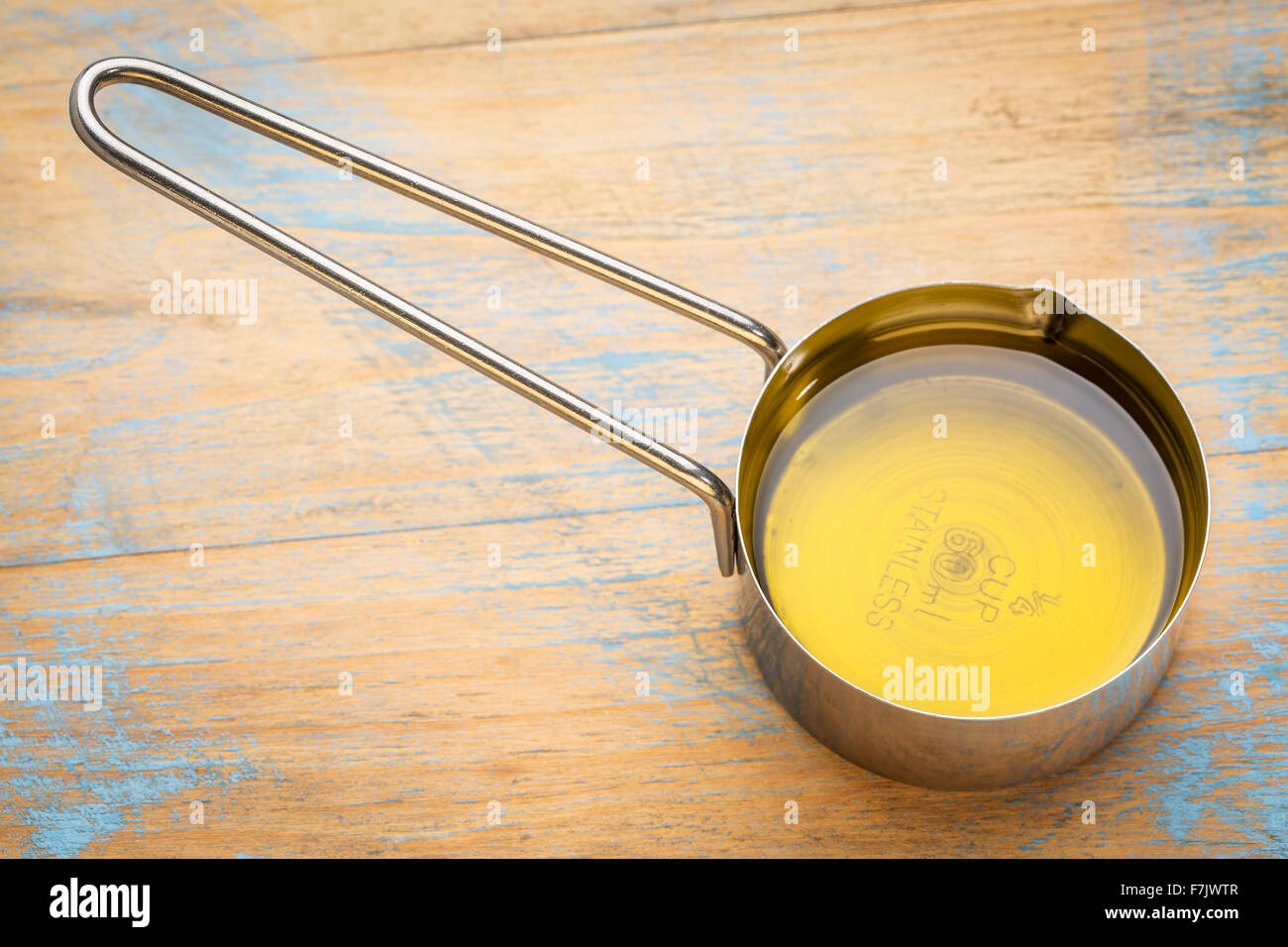 Cooking oil in measuring cup hi-res stock photography and images - Alamy