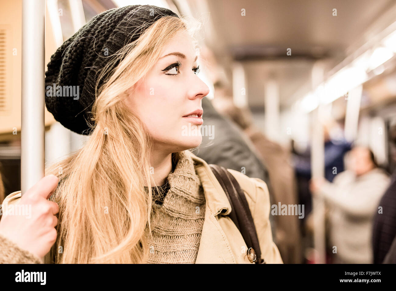 Woman inside the Metro Stock Photo - Alamy