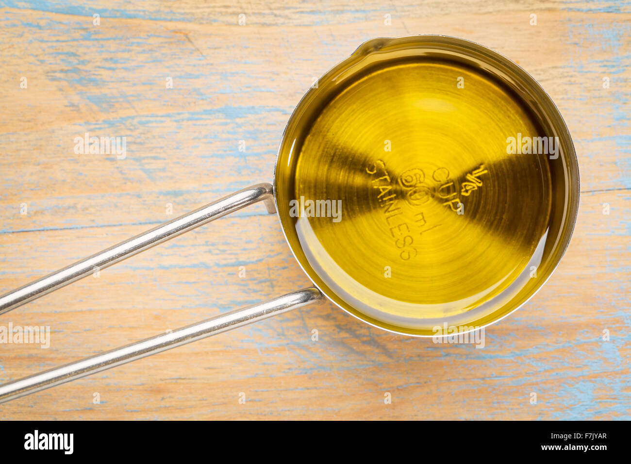 Measuring cup of oil hi-res stock photography and images - Alamy