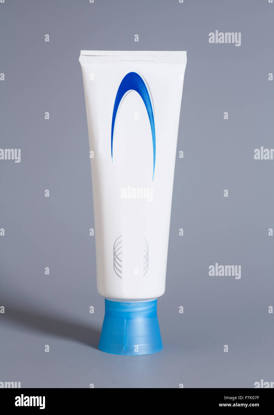 White Toothpaste Tube Isolated on Gray Background Stock Photo - Alamy