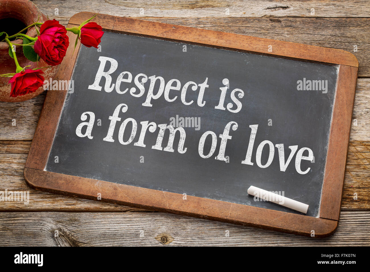 Respect is a form of love - white chalk text on a vintage slate ...