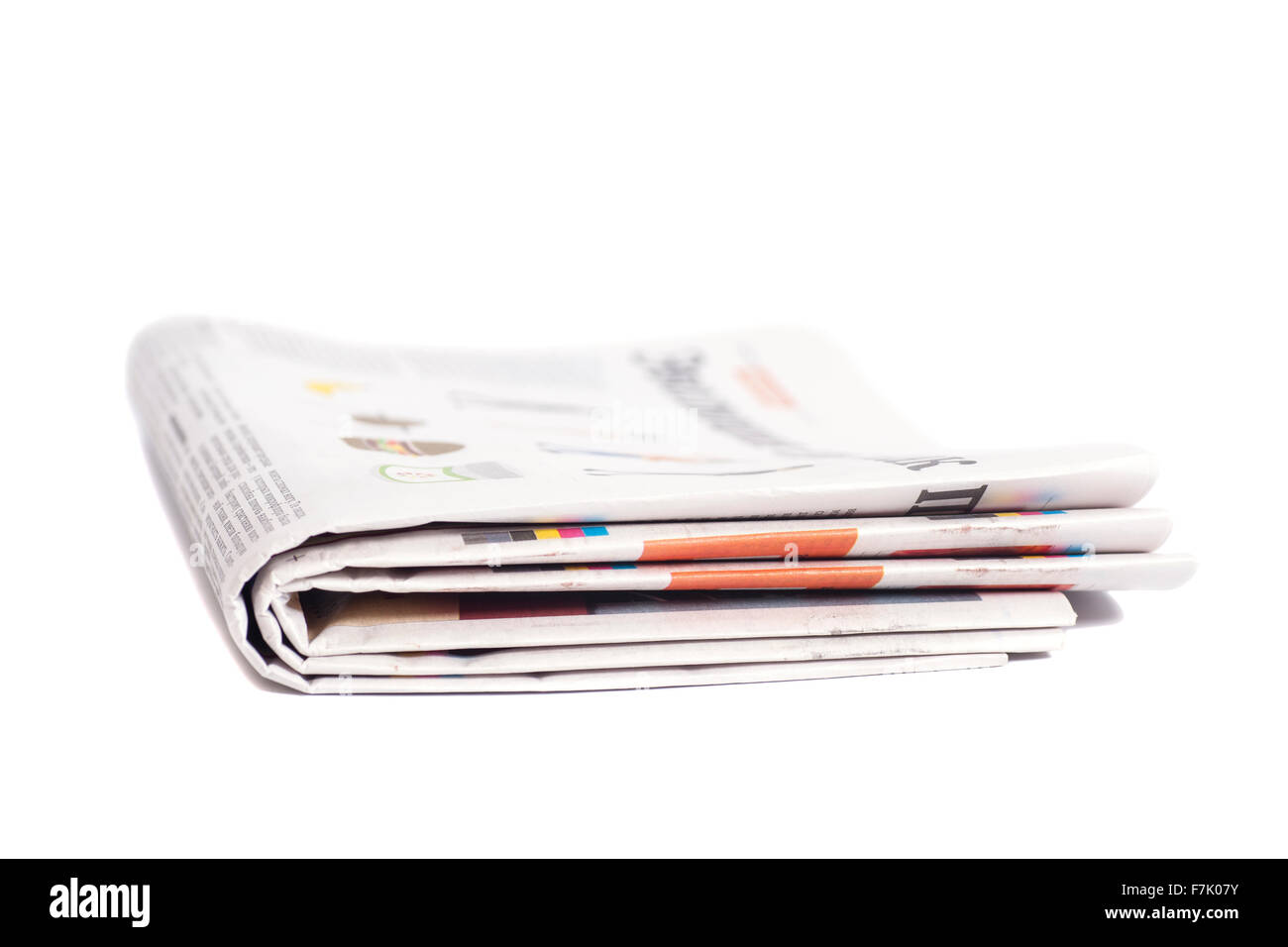 Folded newspapers on white isolated background Stock Photo - Alamy