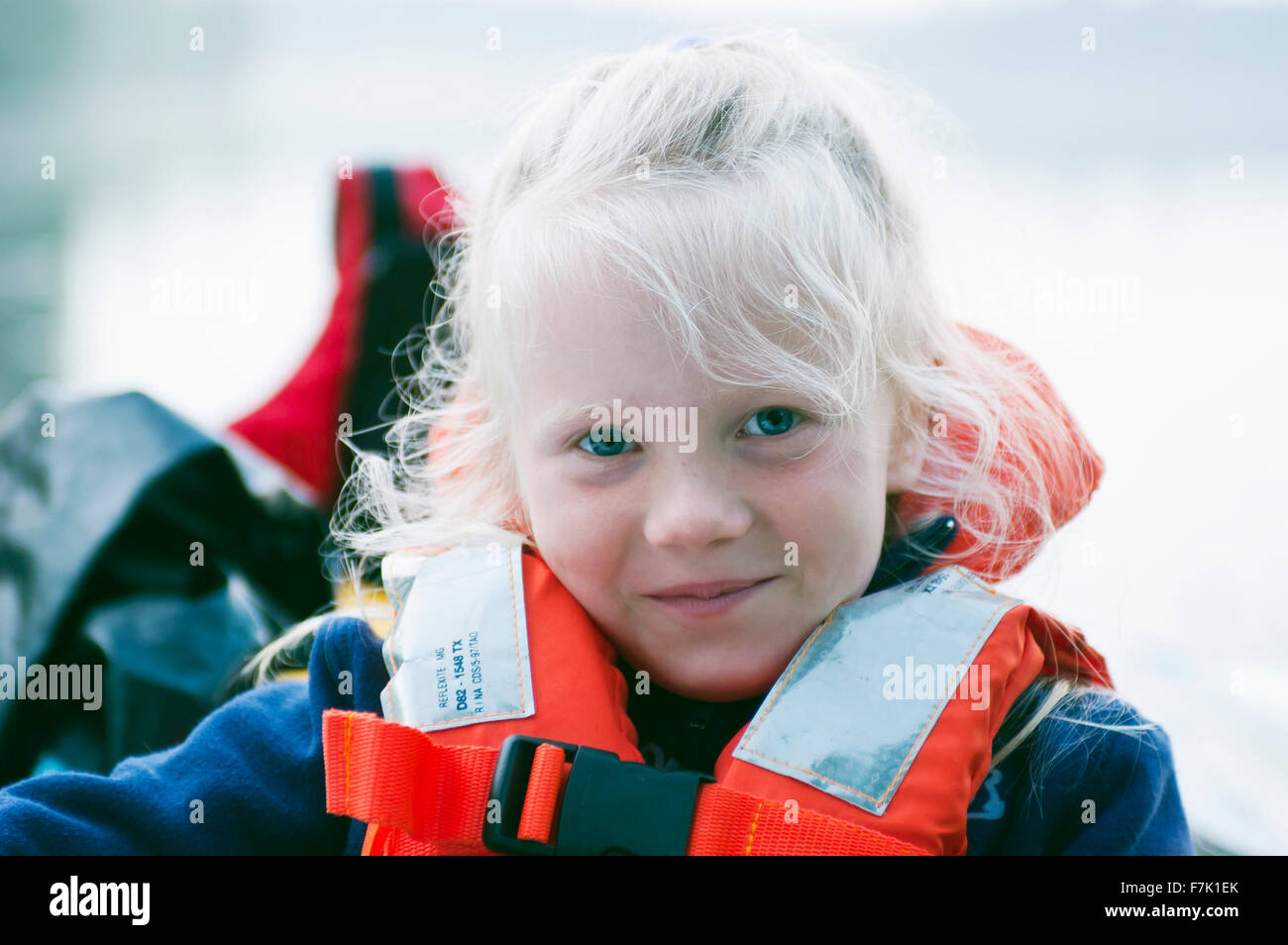 Young girl in life vest Stock Photo - Alamy