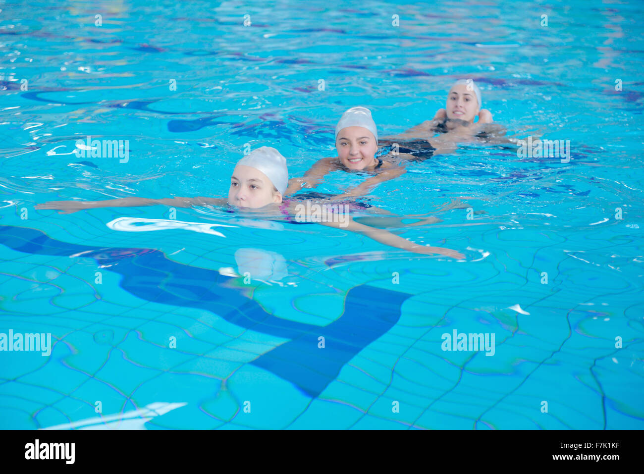 help and rescue action in swimming school at pool Stock Photo - Alamy