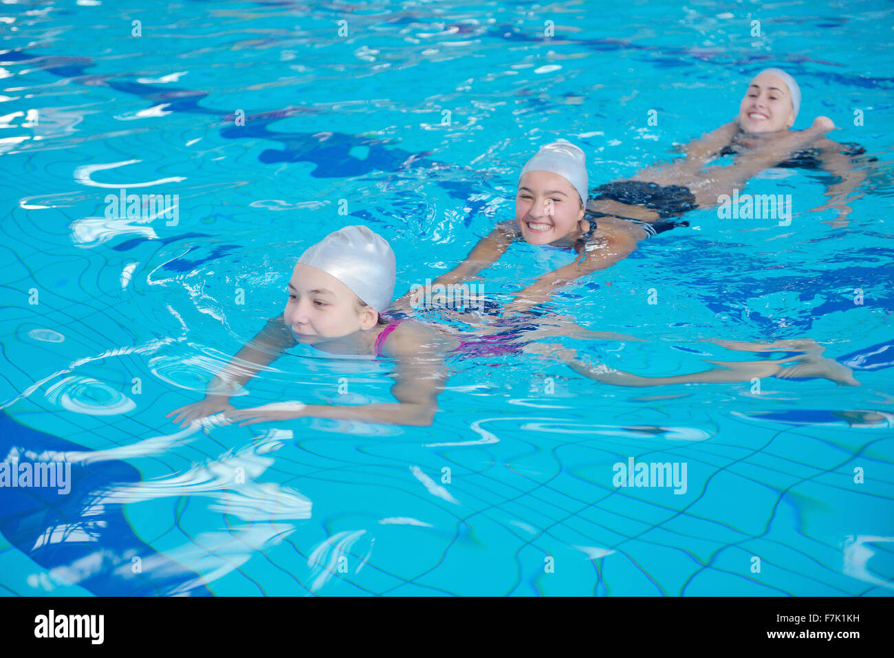 help and rescue action in swimming school at pool Stock Photo - Alamy