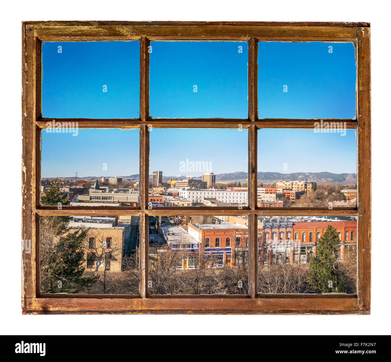 abstract cityscape view through a vintage sash window featuring the ...