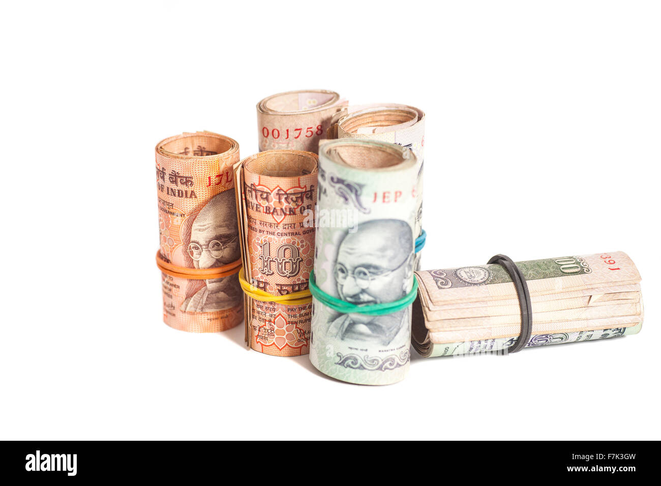 Rolls of Indian rupees isolated on white Stock Photo - Alamy