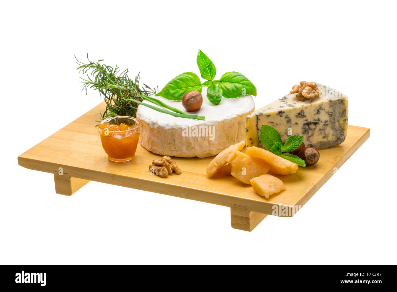 Assorted cheese - brie, dor blue and hard old yellow cheese Stock Photo ...