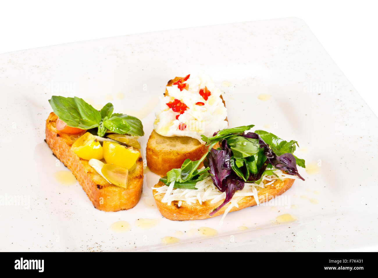 different colored Canapes on a white background Stock Photo - Alamy