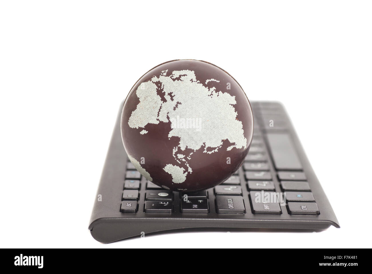 Earth on keyboard isolated on white Stock Photo - Alamy